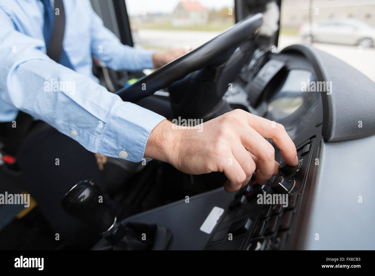 close up of driver driving passenger bus Stock Photo - Alamy