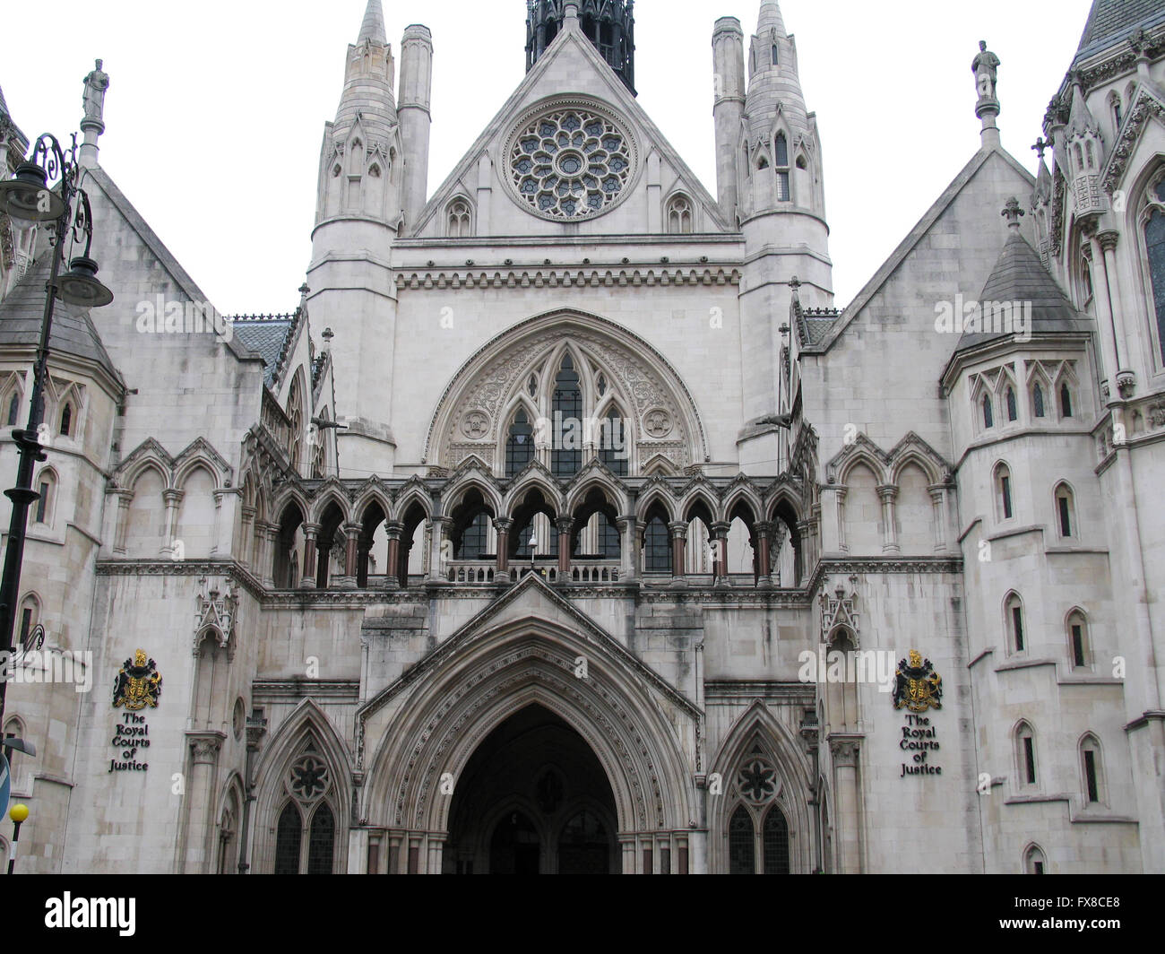 The main entrance to the Royal Courts of Justice building in central ...