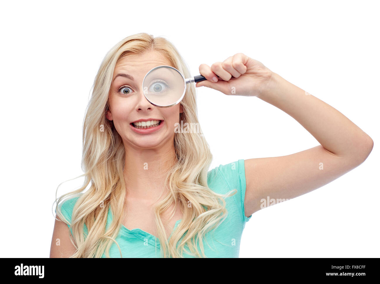 Surprised young woman magnifying glass hi-res stock photography and ...
