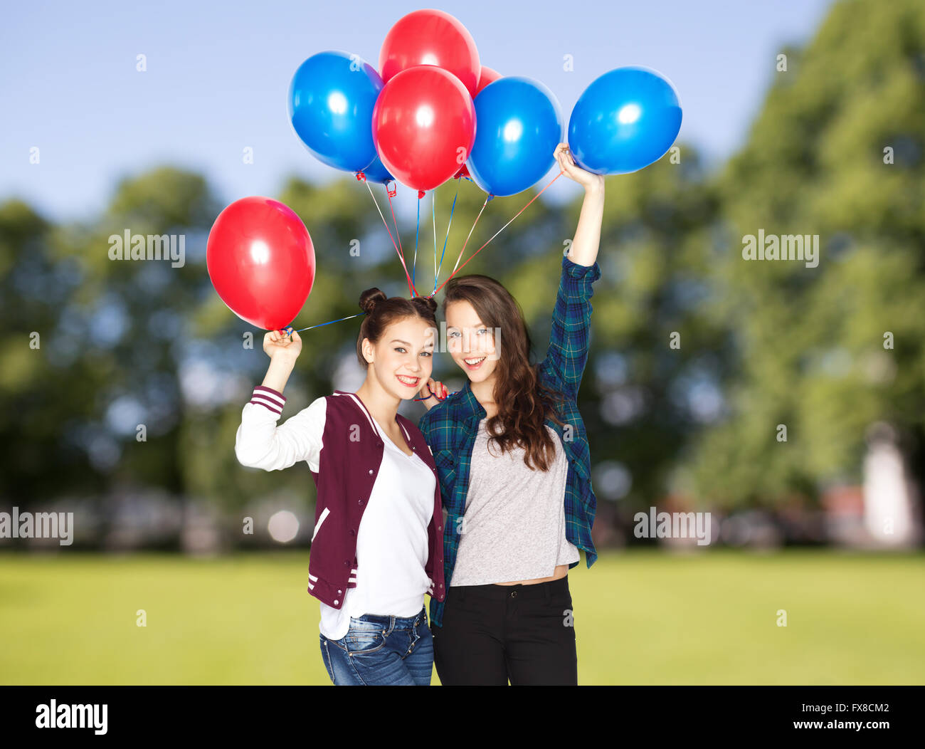 Girl hanging by balloons hi-res stock photography and images - Alamy