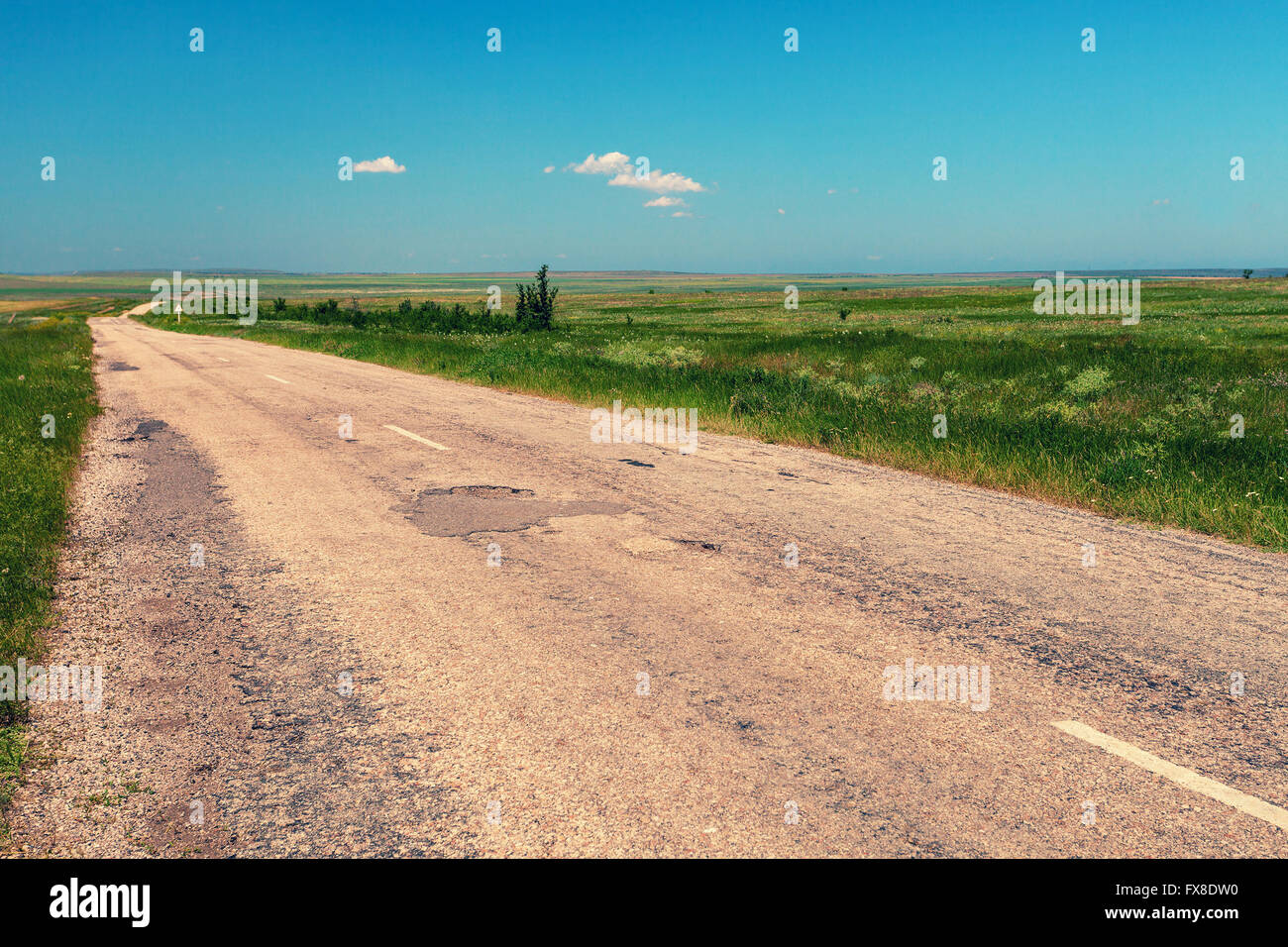 Road in the steppe Stock Photo - Alamy