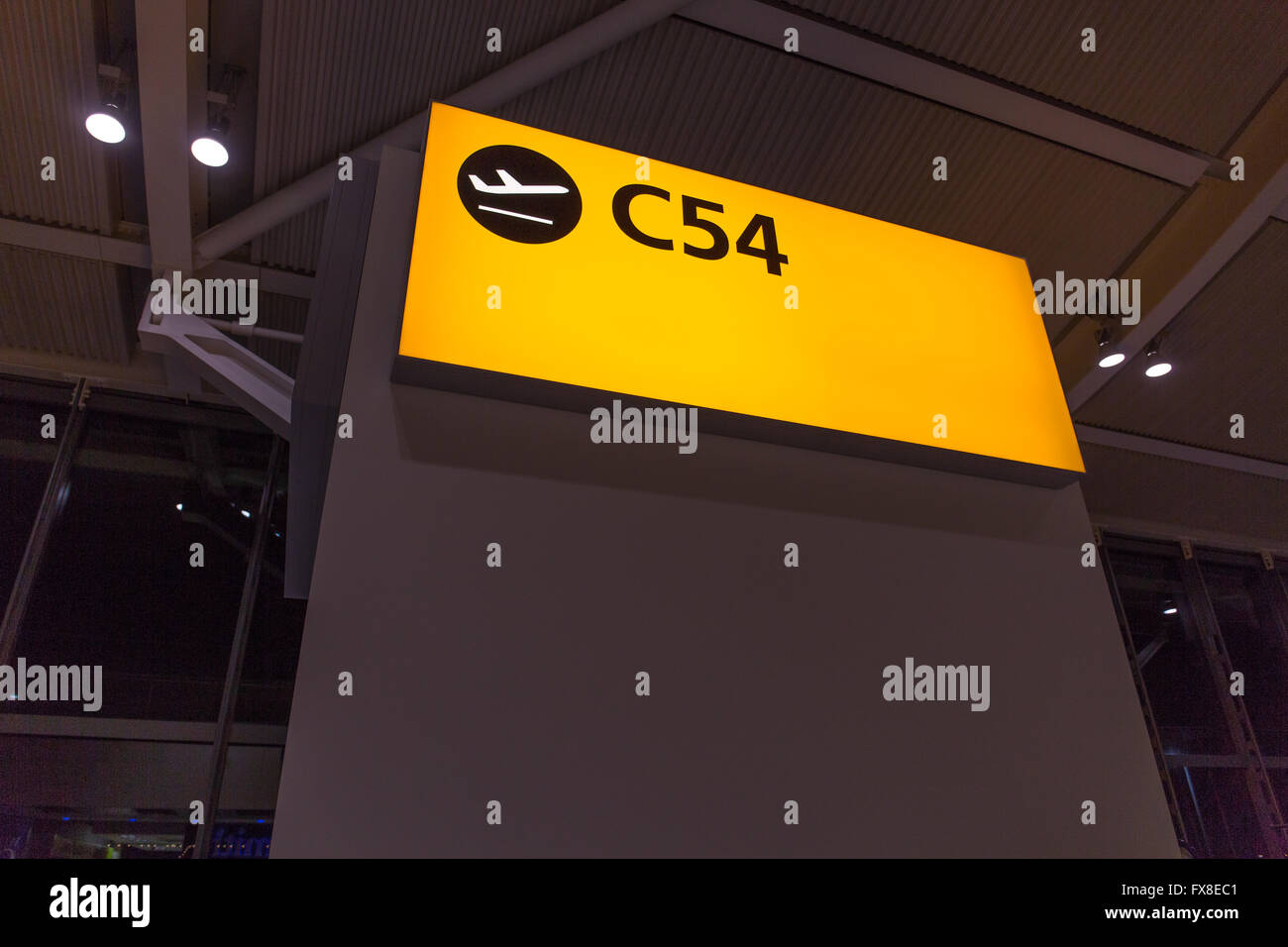 Departure gate signs at Heathrow Airport Stock Photo - Alamy