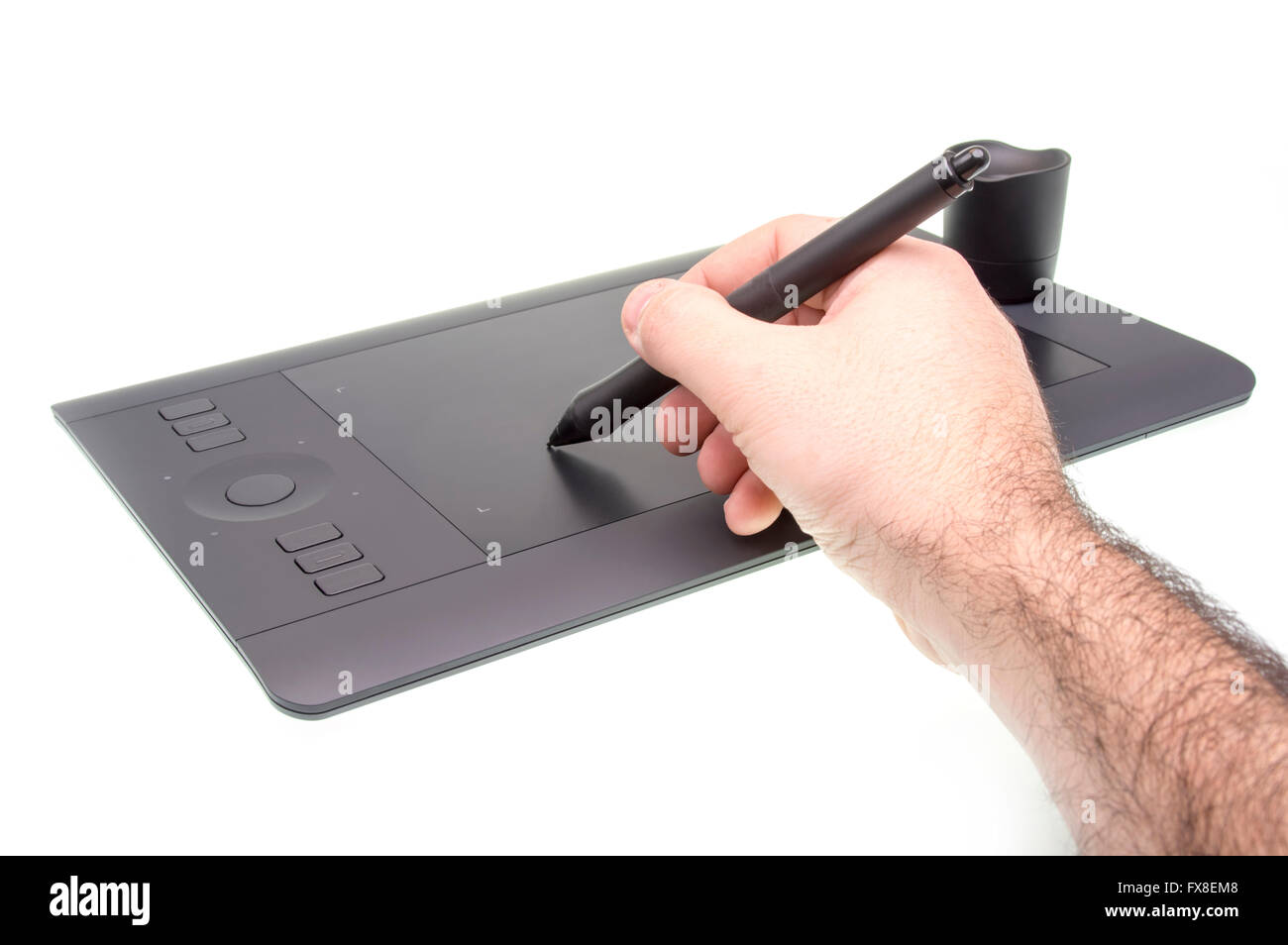 Hand drawing on a graphic tablet with pen Stock Photo - Alamy