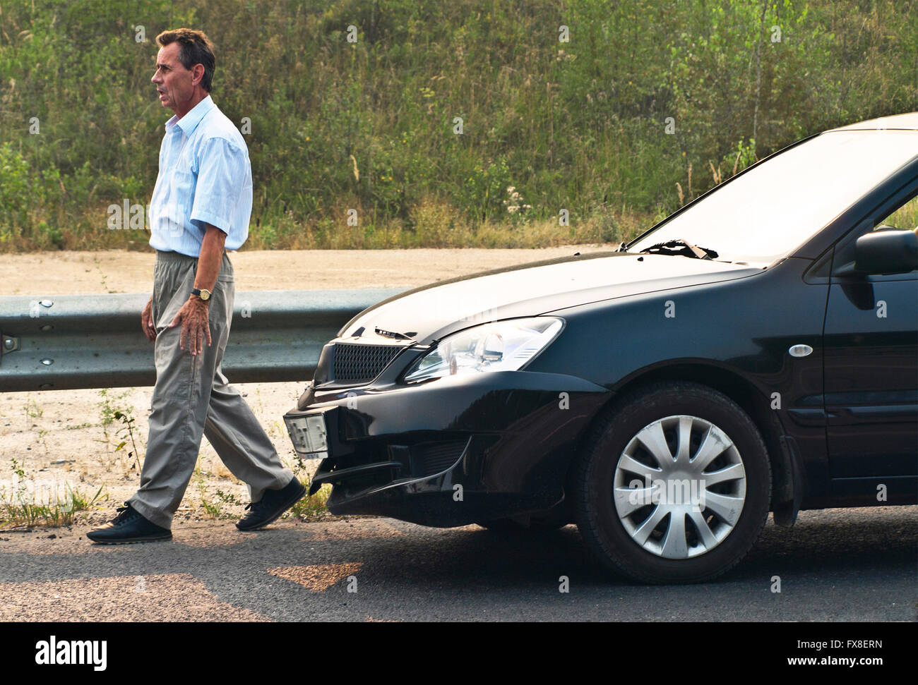broken car and driver Stock Photo - Alamy