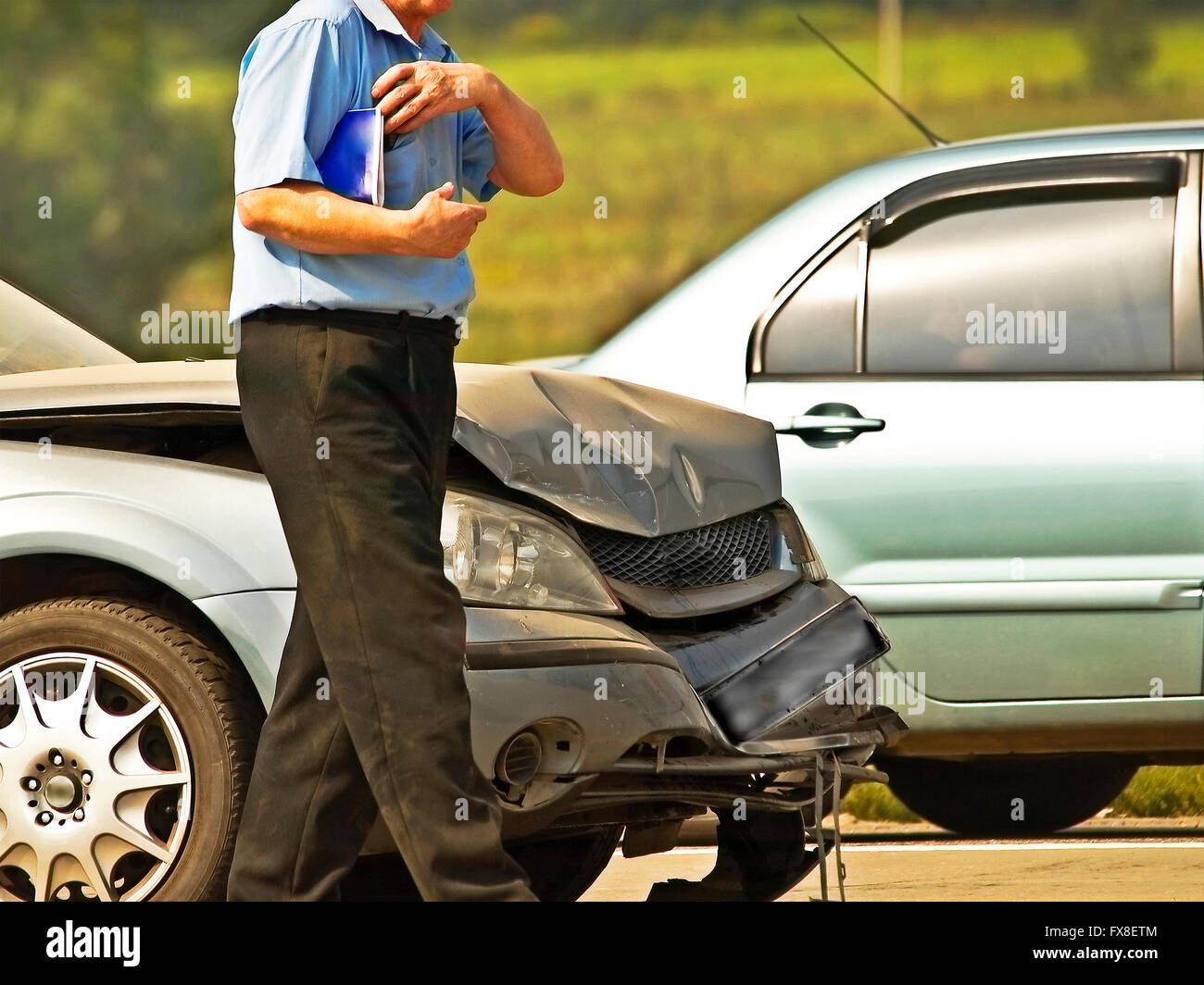 broken car and driver Stock Photo - Alamy