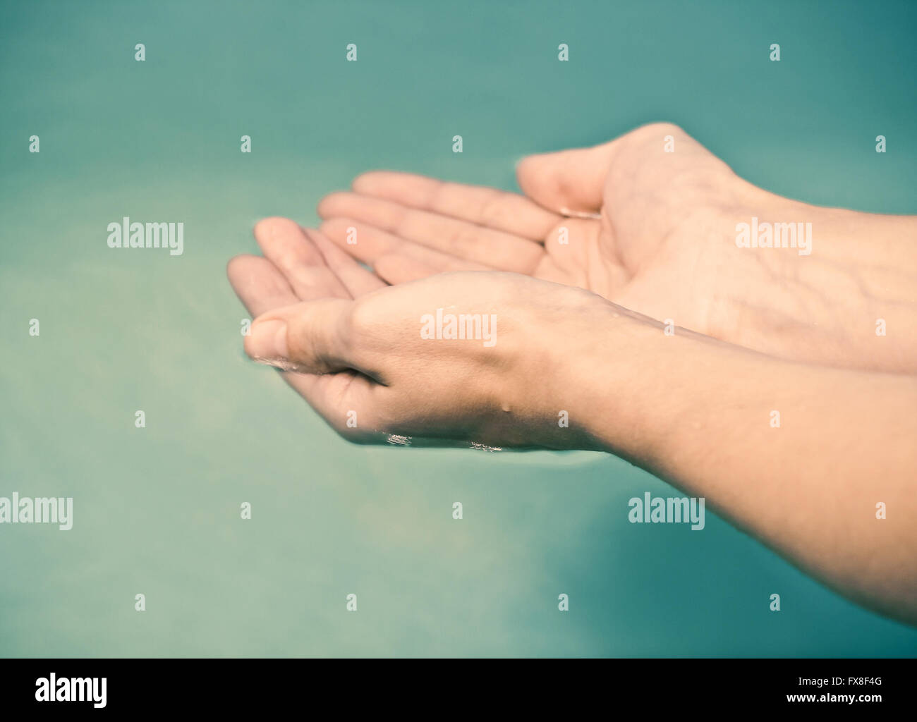 hands in water Stock Photo - Alamy