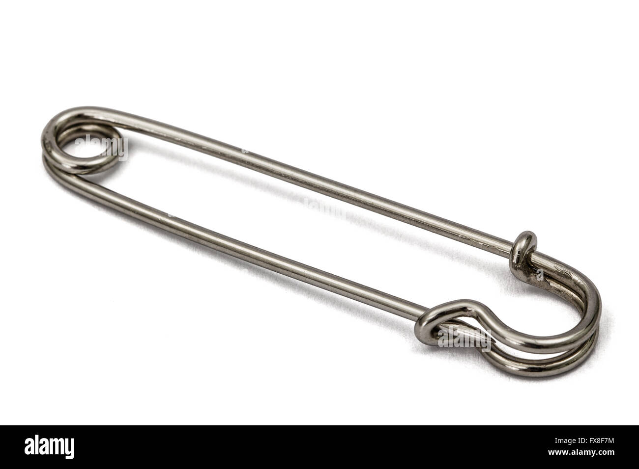 Safety pin, isolated on white background, with clipping path Stock ...