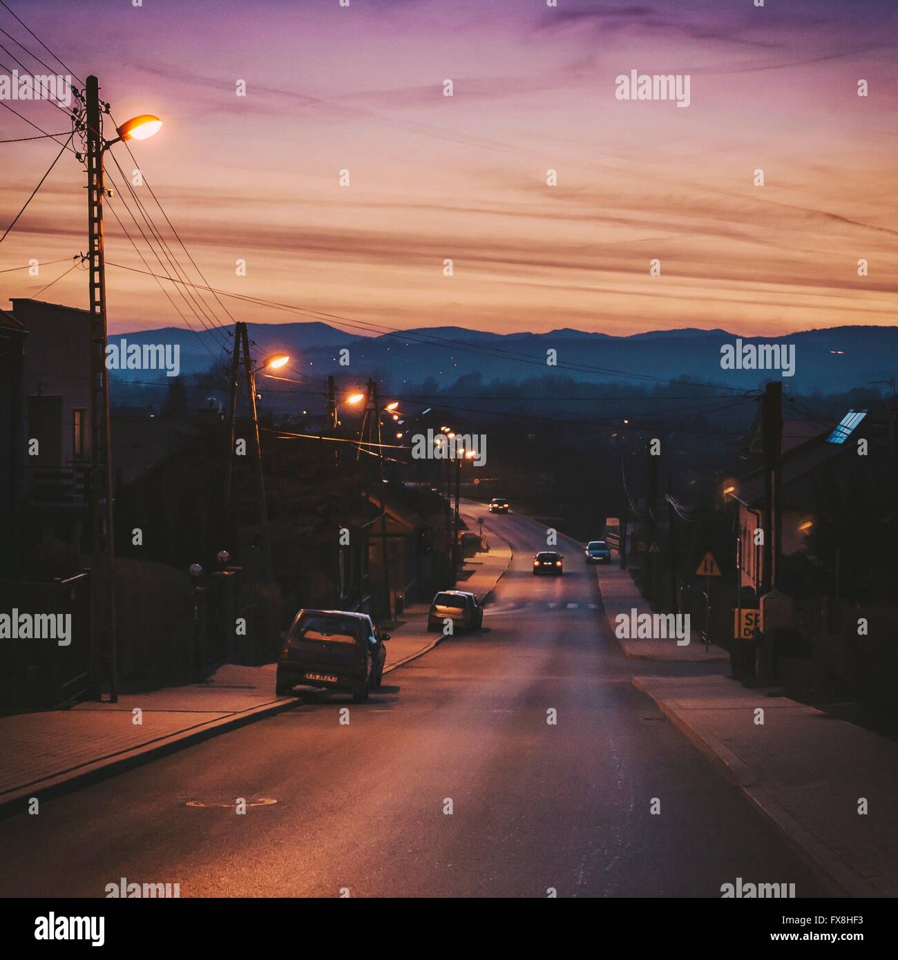 Sunset over the street Stock Photo - Alamy