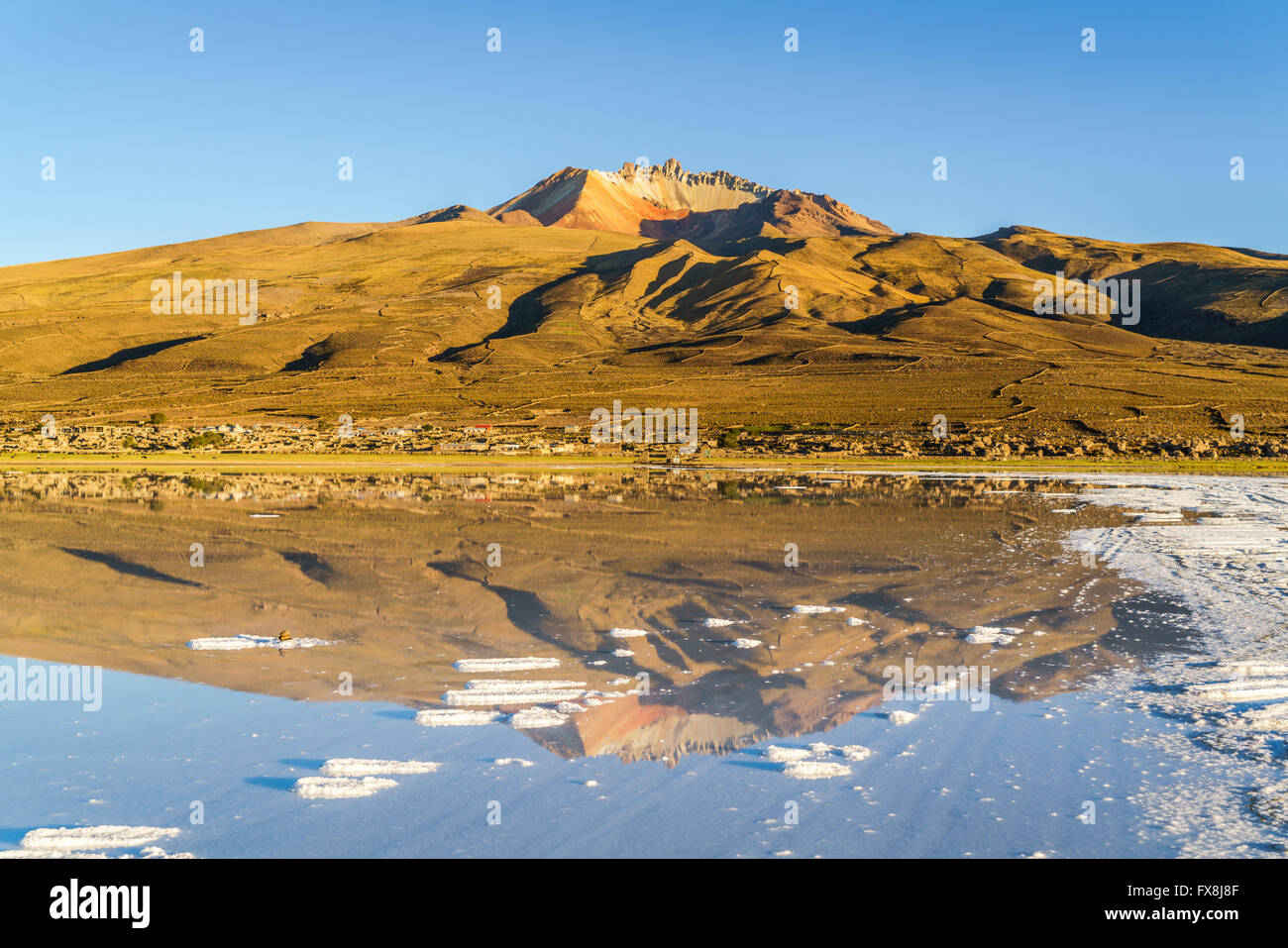Dormant volcano and Coqueza Village at Salar De Uyuni in Bolivia Stock ...