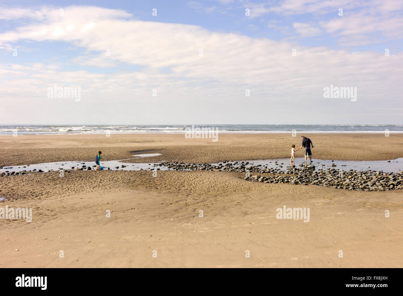 Children fishing in rock pools hi-res stock photography and images - Alamy