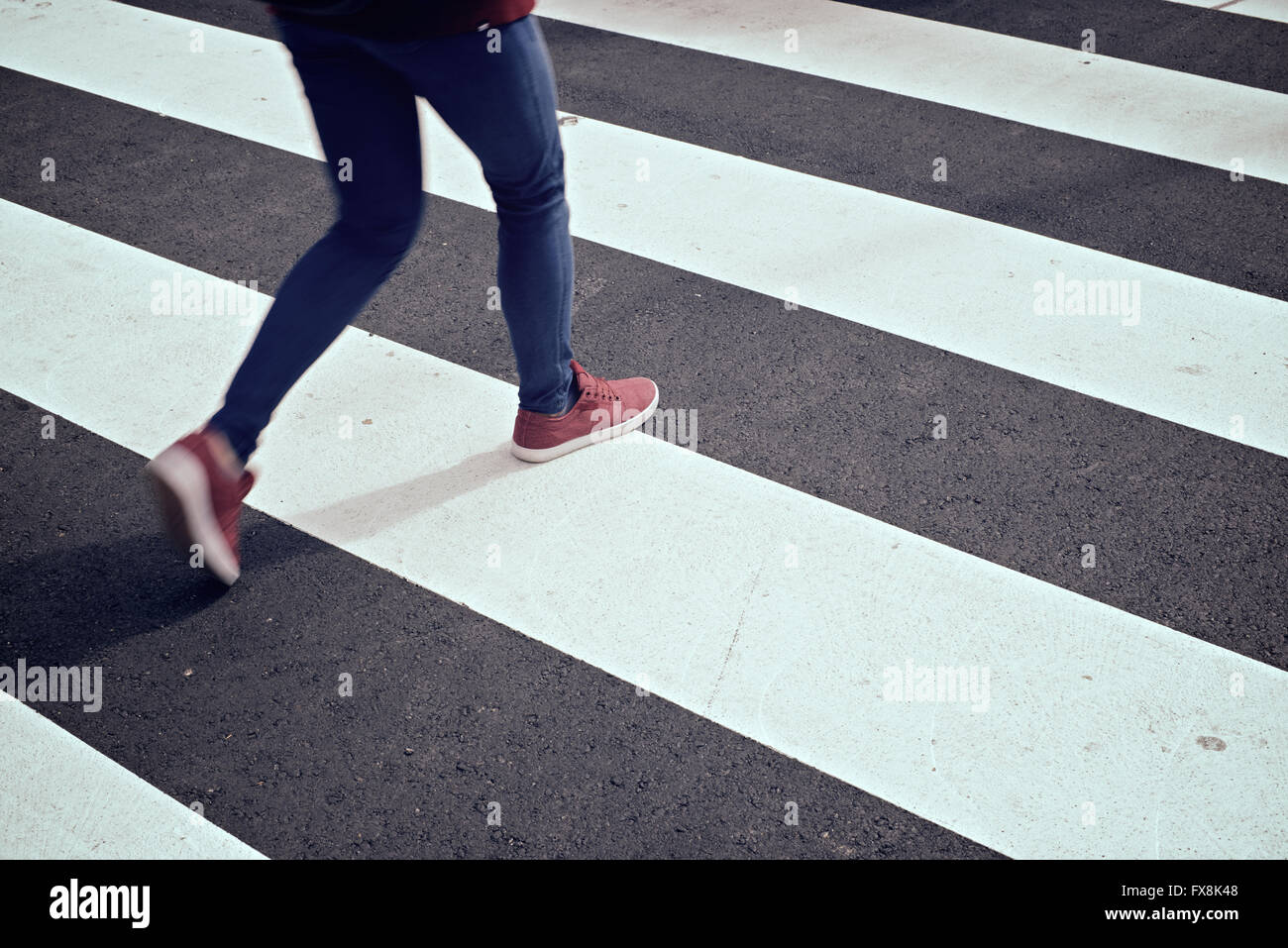 Young woman crossing a zebra crossing. Zaragoza, Aragon, Spain Stock ...