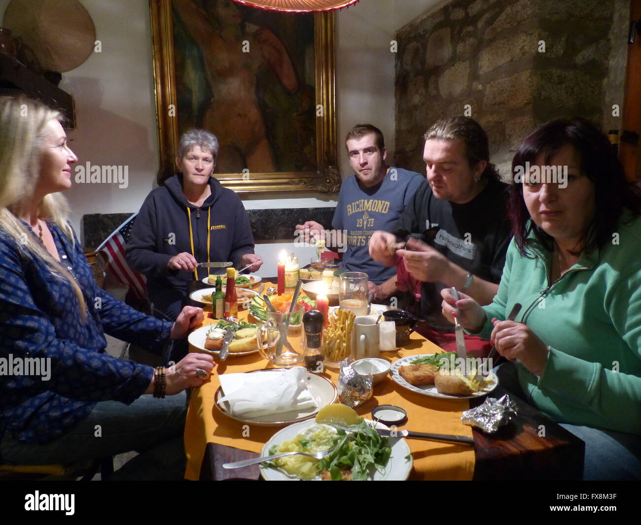 Friends at dinner table Stock Photo - Alamy