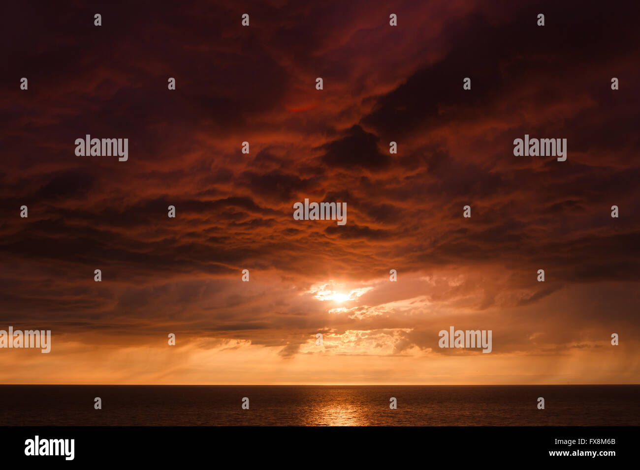 Thundercloud on the background of sunset over the Baltic Sea Stock ...