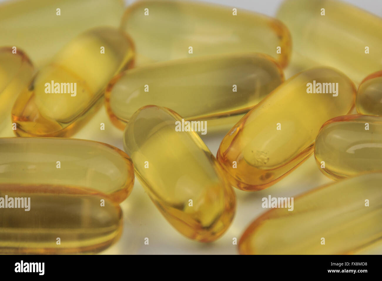 Orange fish oil capsules hi-res stock photography and images - Alamy