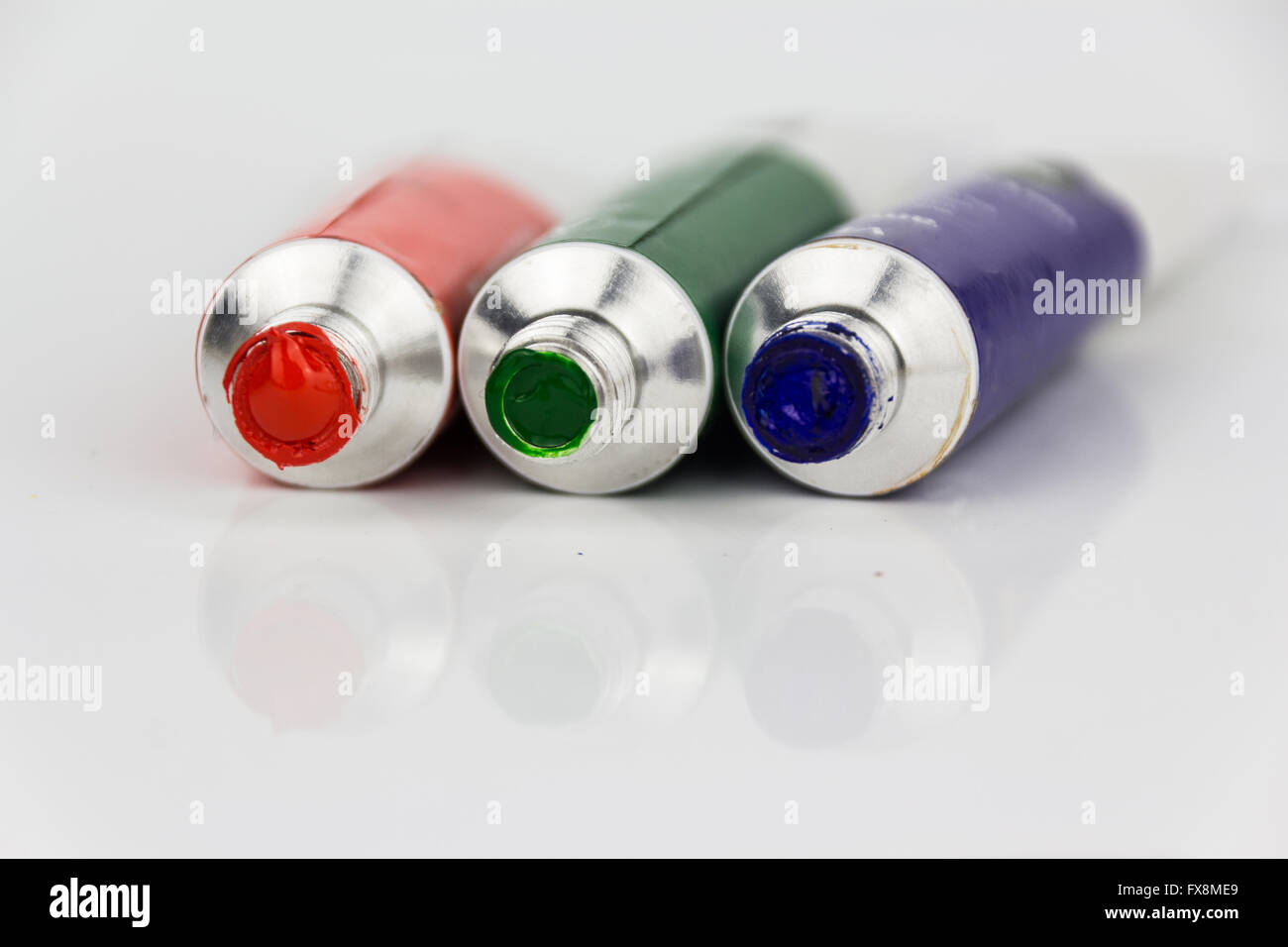 rgb color paint tubes macro on white background Stock Photo - Alamy