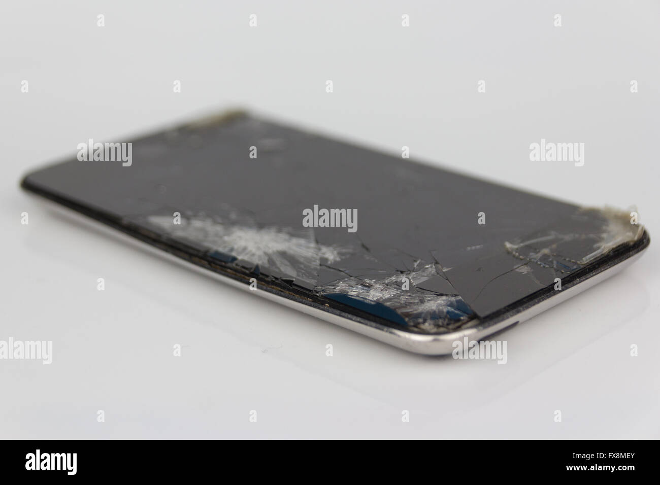 iPod touch with broken display. Isolated on white background Stock ...