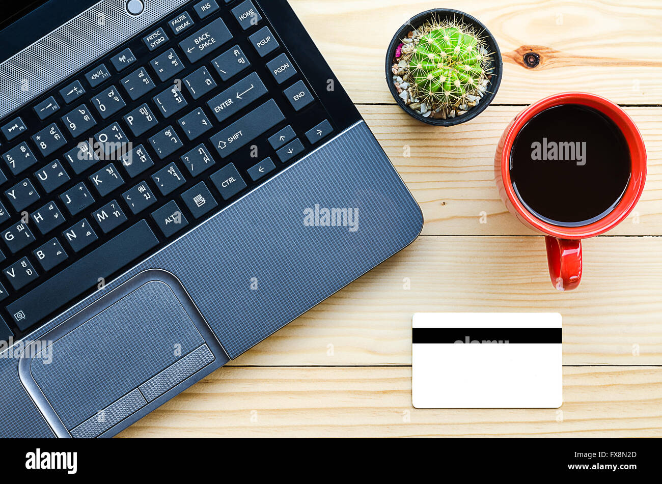 Desk laptop credit card hi-res stock photography and images - Alamy