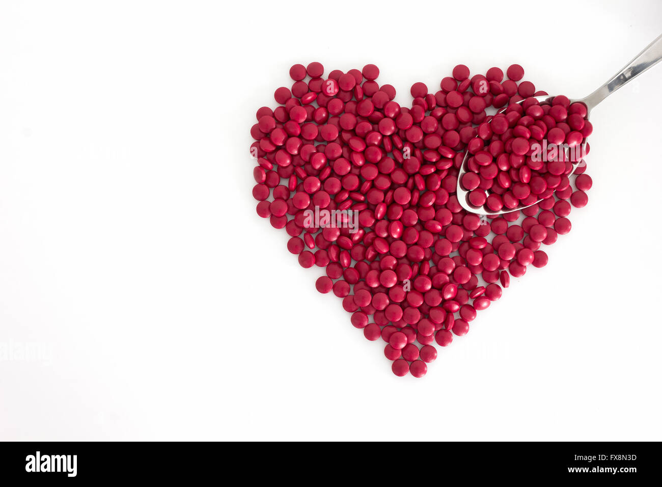 red drugs heart shape Stock Photo - Alamy