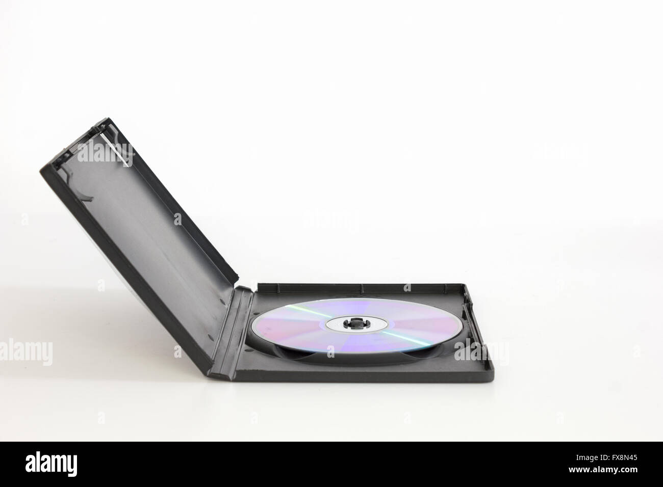 disk in DVD box isolated on white background Stock Photo - Alamy