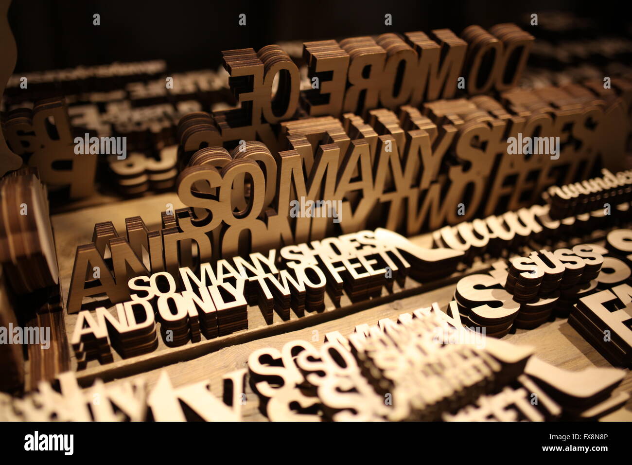 Writing carved out of wood in selective focus Stock Photo - Alamy