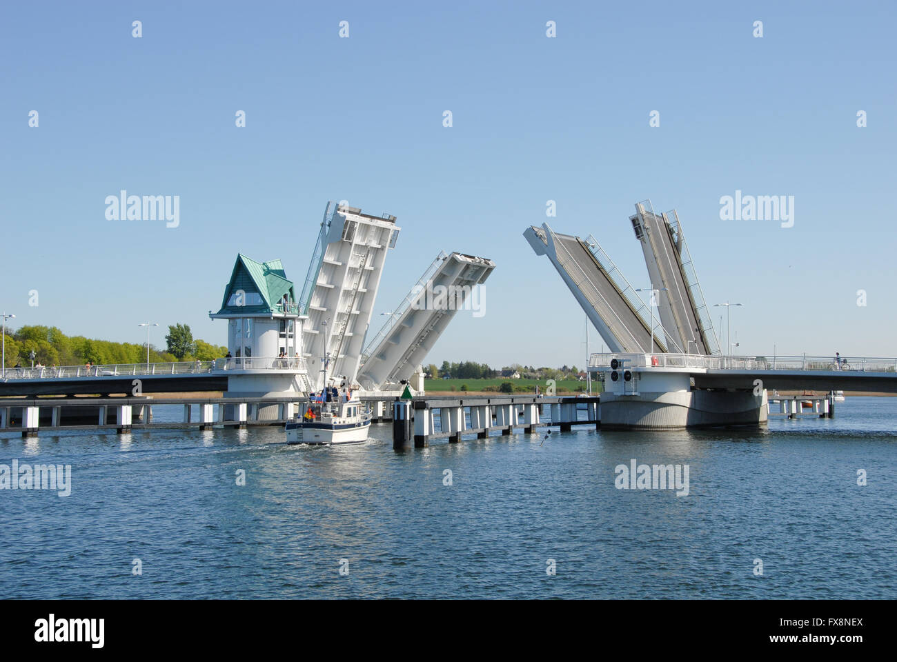 Sailing boat under an opening bascule bridge Stock Photo - Alamy