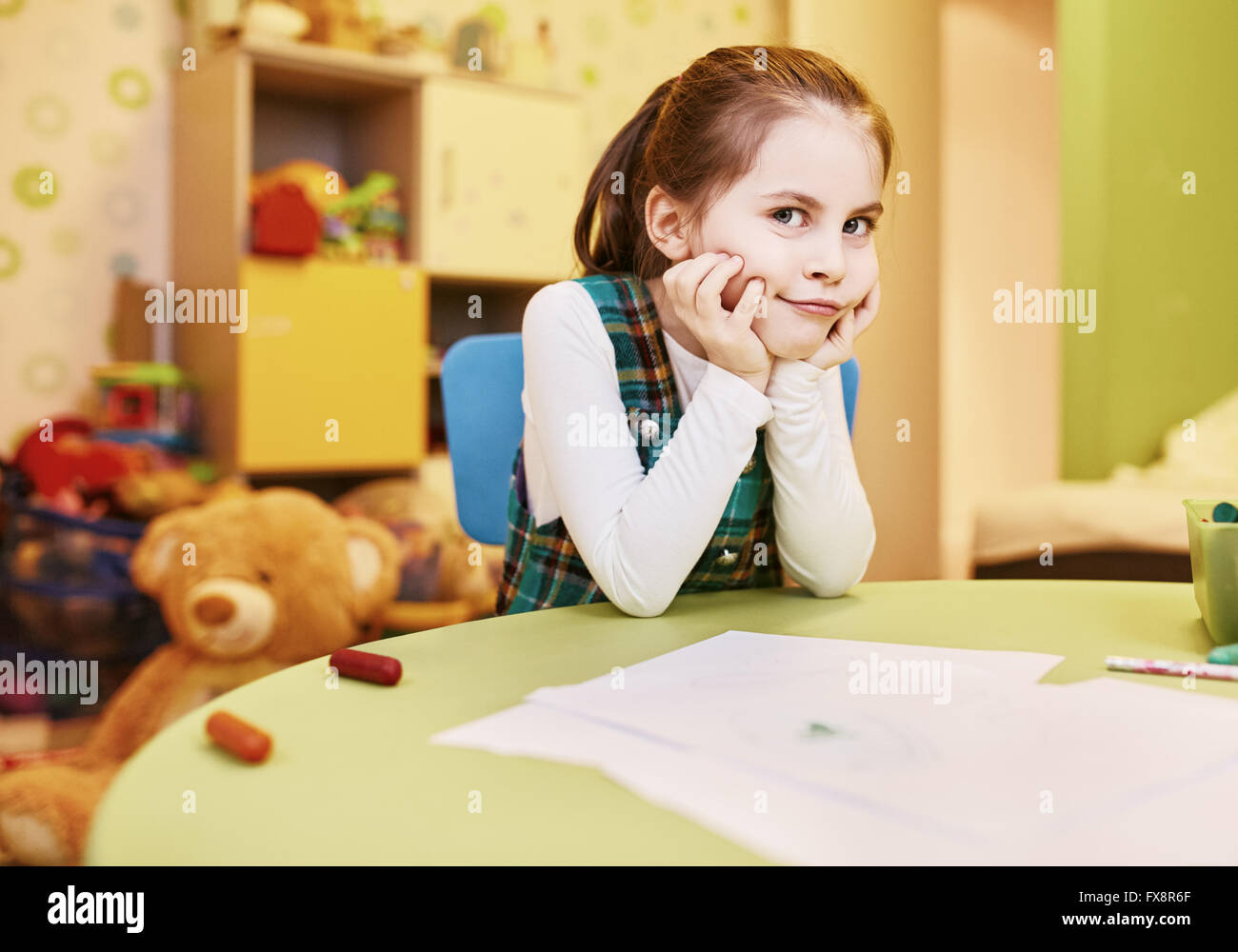 Girl with smirky smile Stock Photo - Alamy