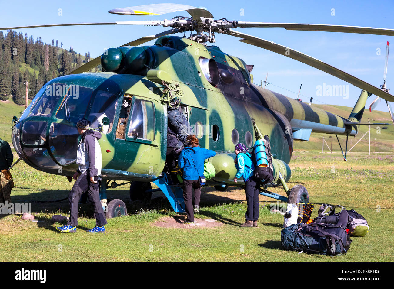 Helicopter Landing Ground and People Preparing for Boarding Stock Photo ...