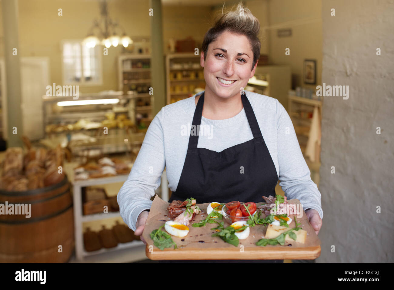 Deli worker sandwich hi-res stock photography and images - Alamy