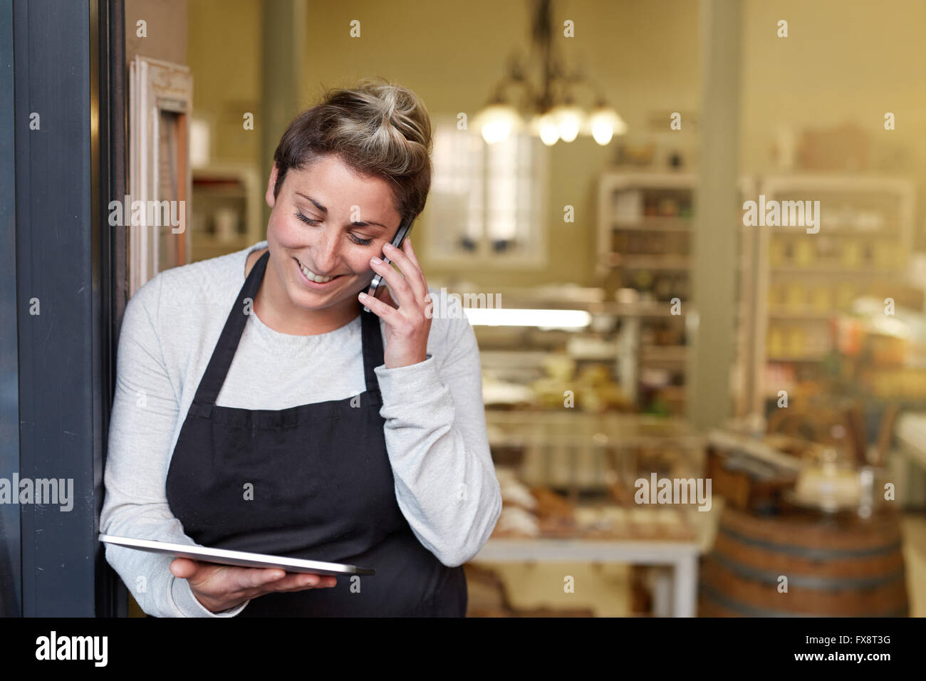 Friendly customer service from the Deli Stock Photo - Alamy