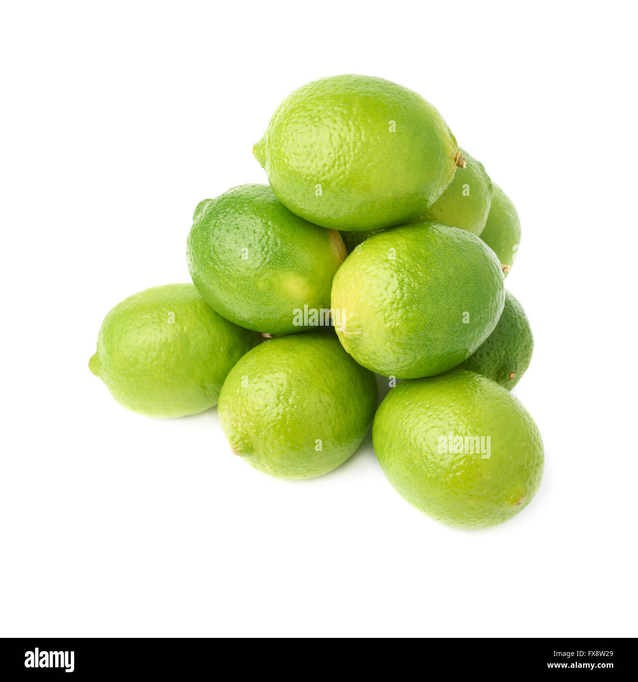 Pile of multiple ripe limes, composition isolated over the white ...