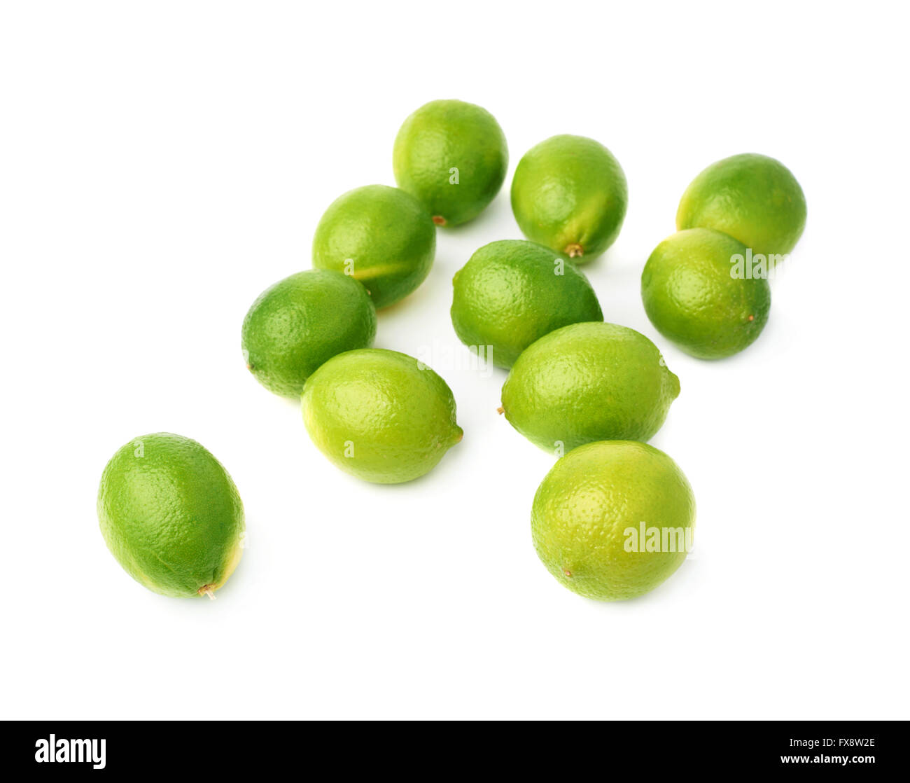 Surface covered with multiple ripe limes, composition isolated over the ...