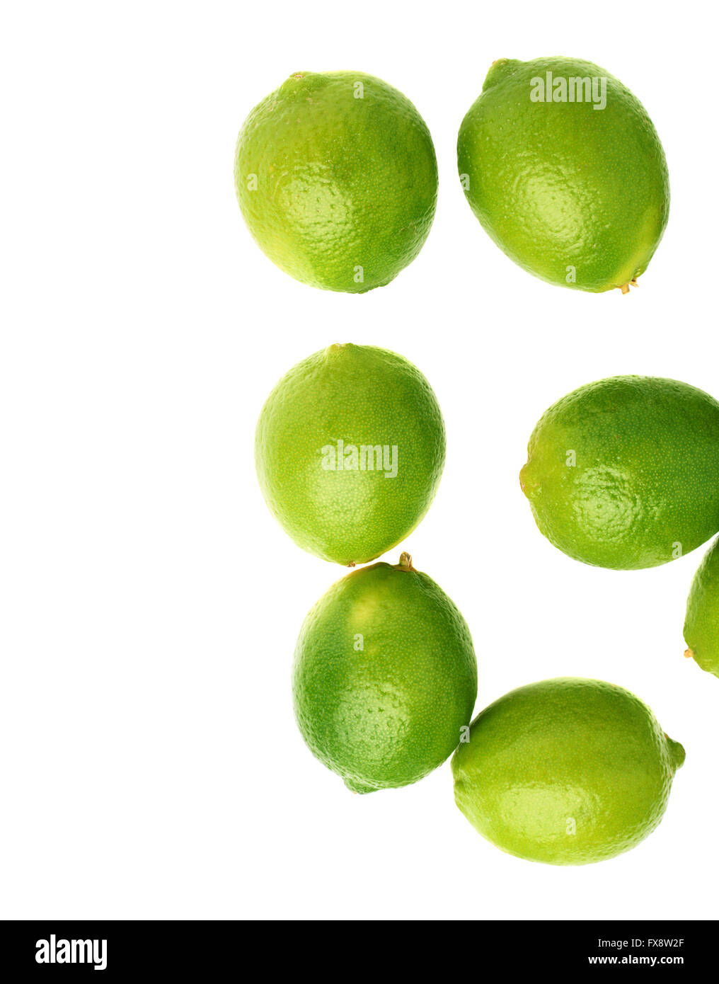 Surface covered with multiple ripe limes, composition isolated over the ...