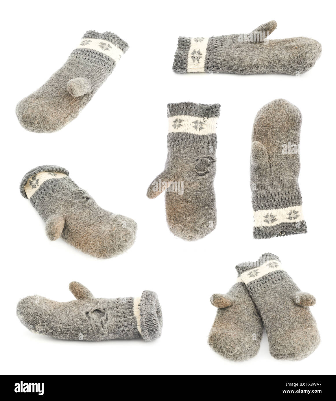 Old gray frayed mitten isolated Stock Photo - Alamy