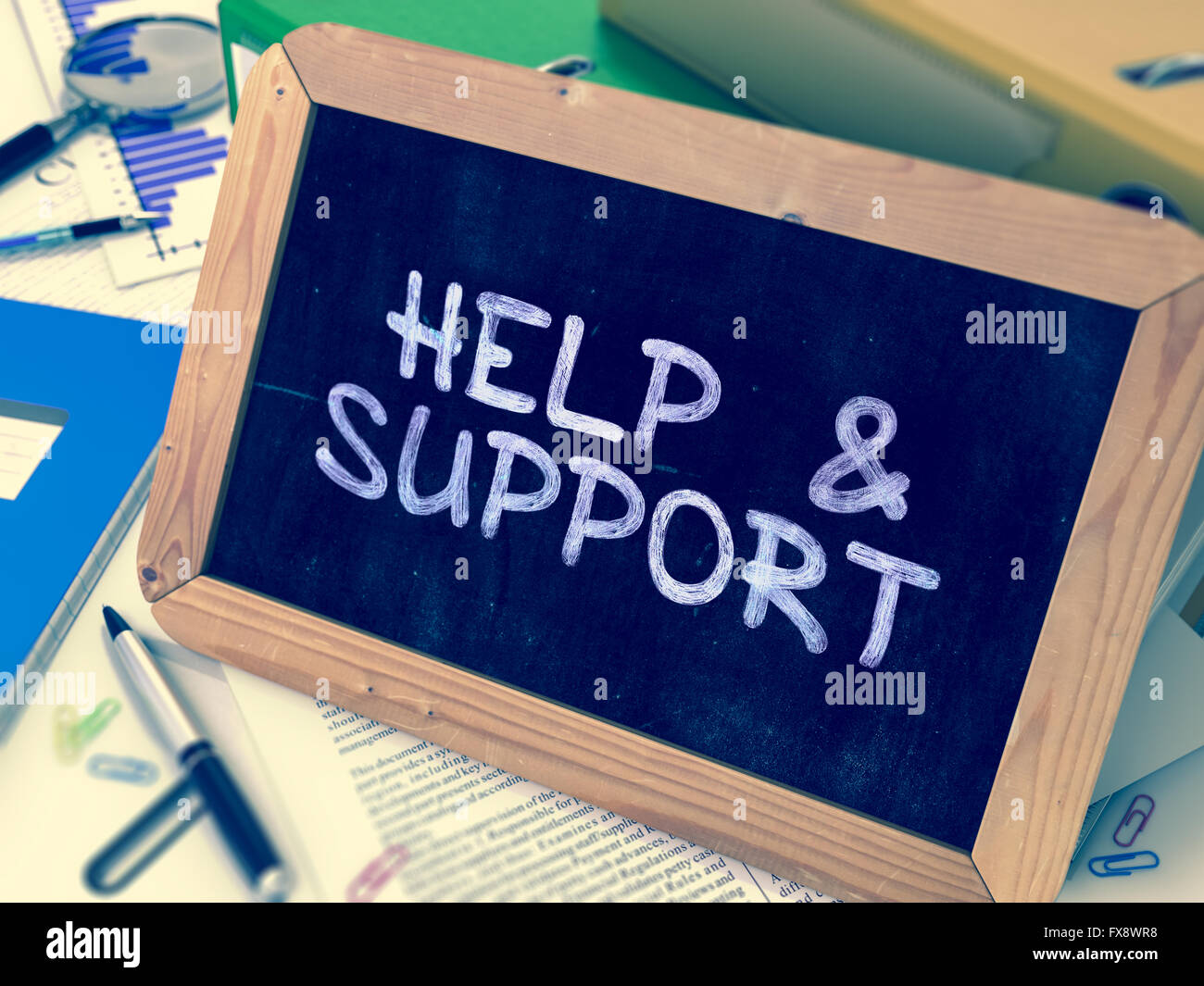 Handwritten Help and Support on a Chalkboard Stock Photo - Alamy