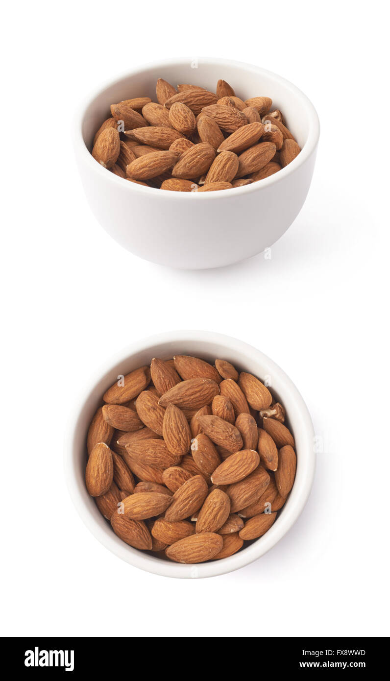 Bowl full of almond seeds isolated Stock Photo - Alamy