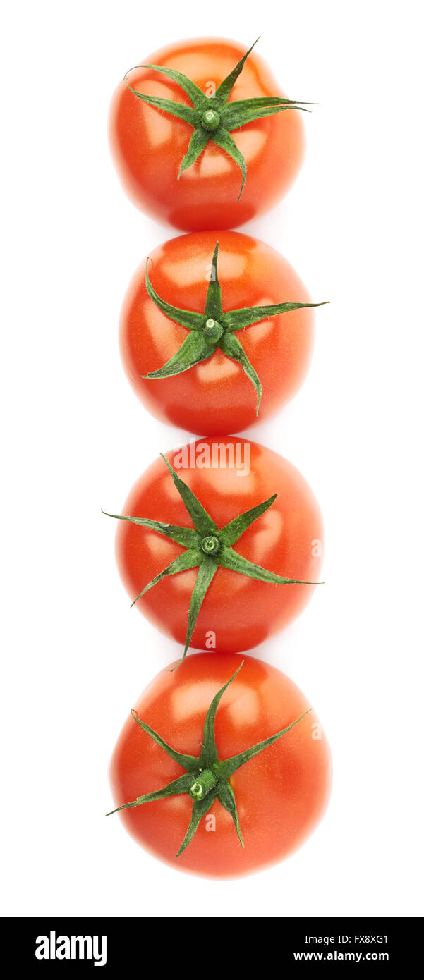 Four tomatoes in a line isolated Stock Photo - Alamy