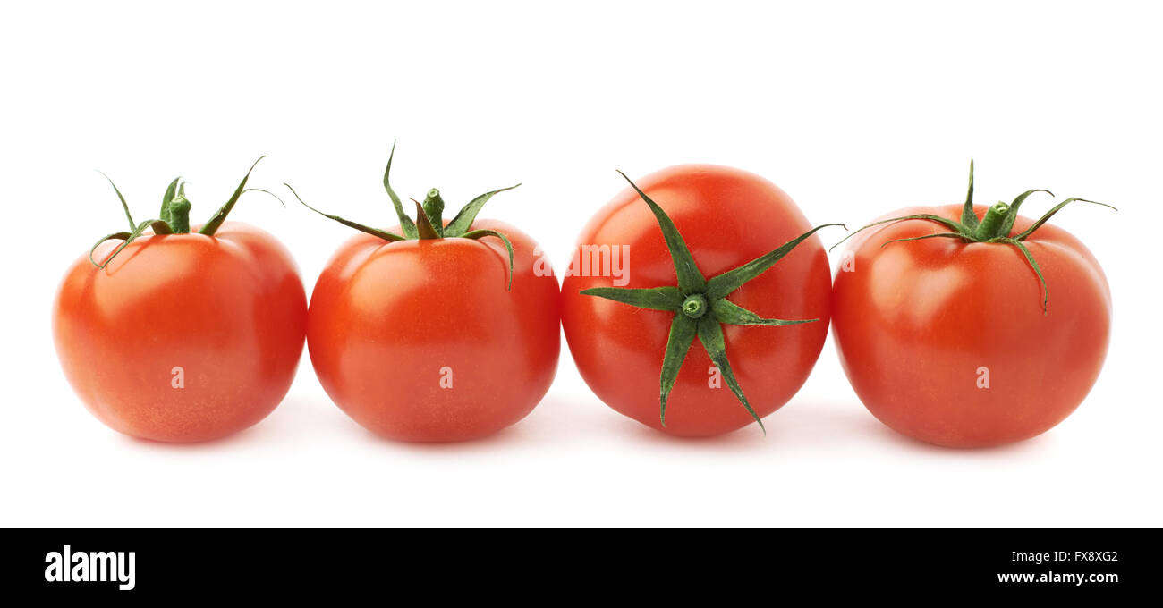 Four tomatoes in a line isolated Stock Photo - Alamy