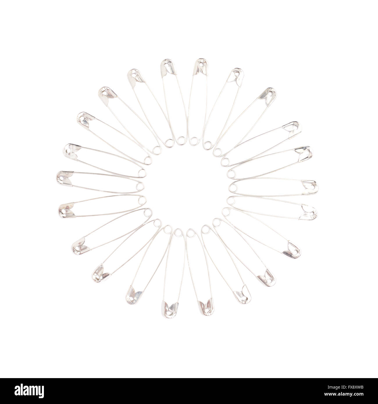 Round frame made of safety pins isolated on white background Stock ...