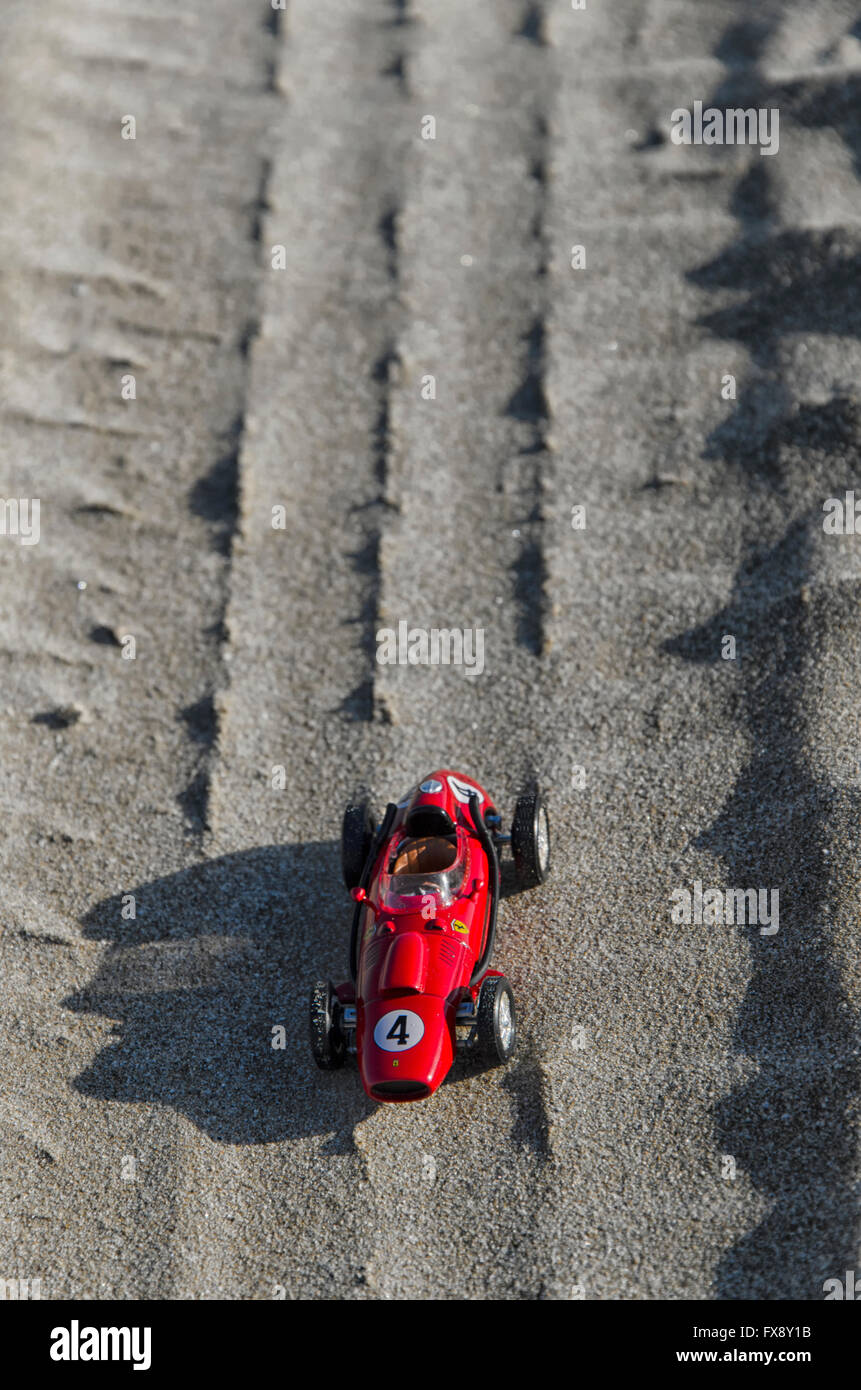 View of model of a historical car and wheel tracks Stock Photo - Alamy