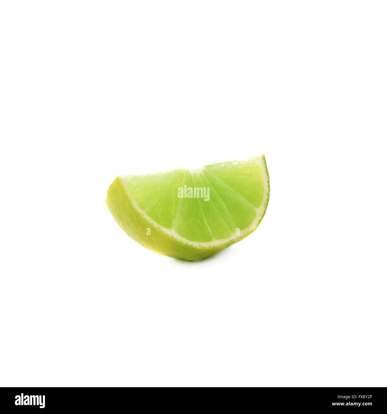 Slice section of lime isolated over the white background Stock Photo ...