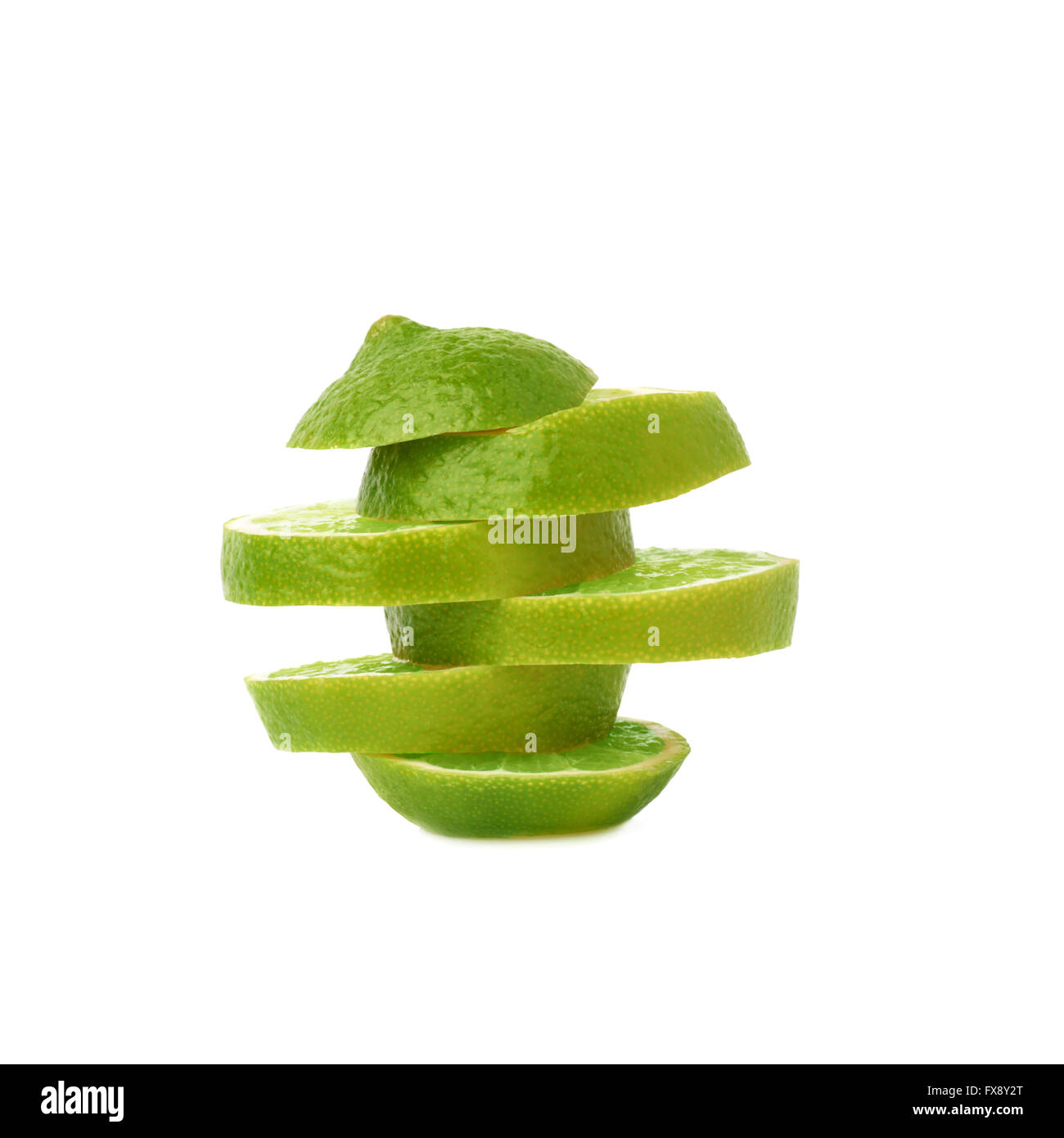 Fresh lime cut in slices isolated over the white background Stock Photo ...