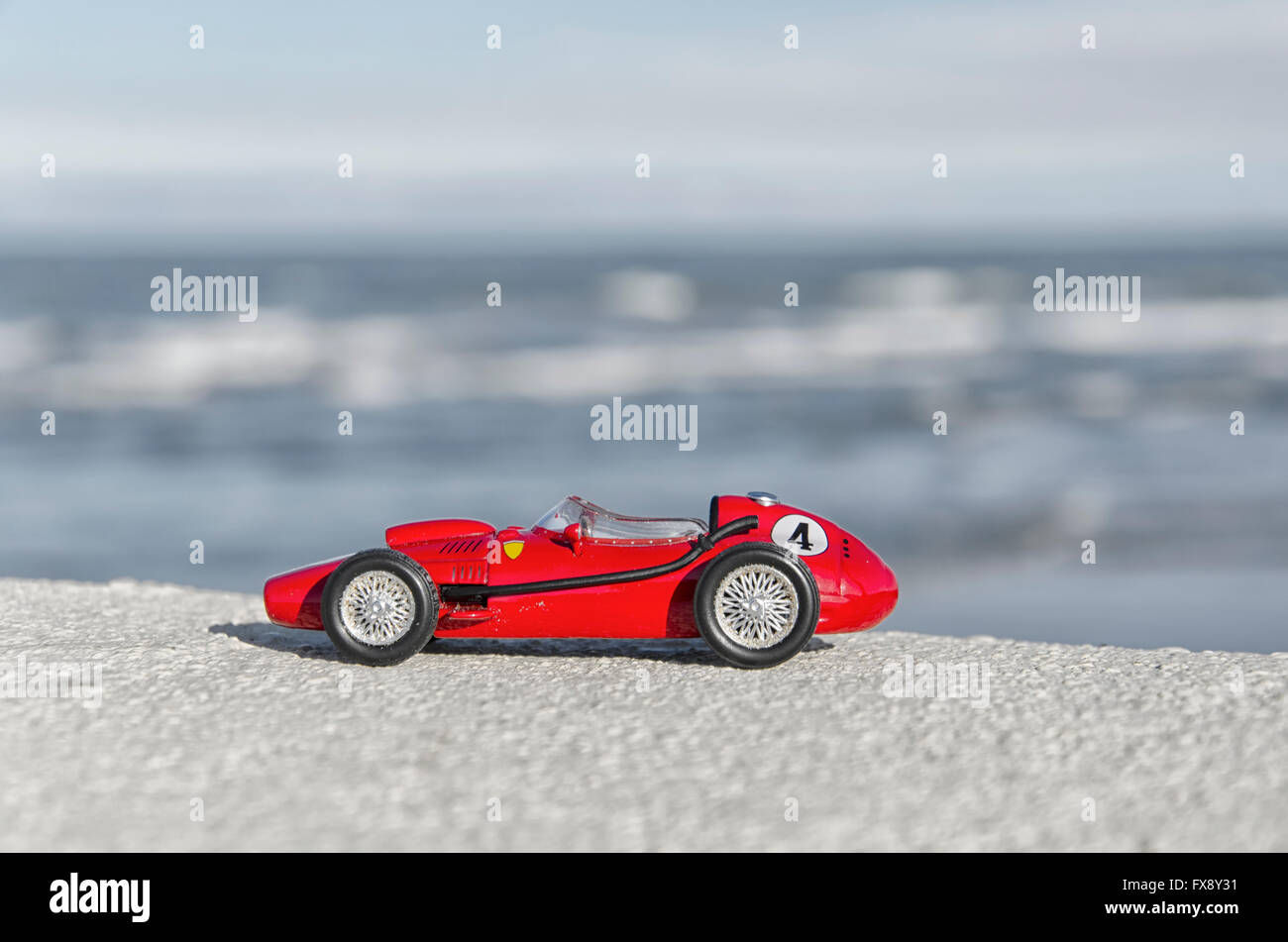 View of model of a historical car over the sea Stock Photo - Alamy