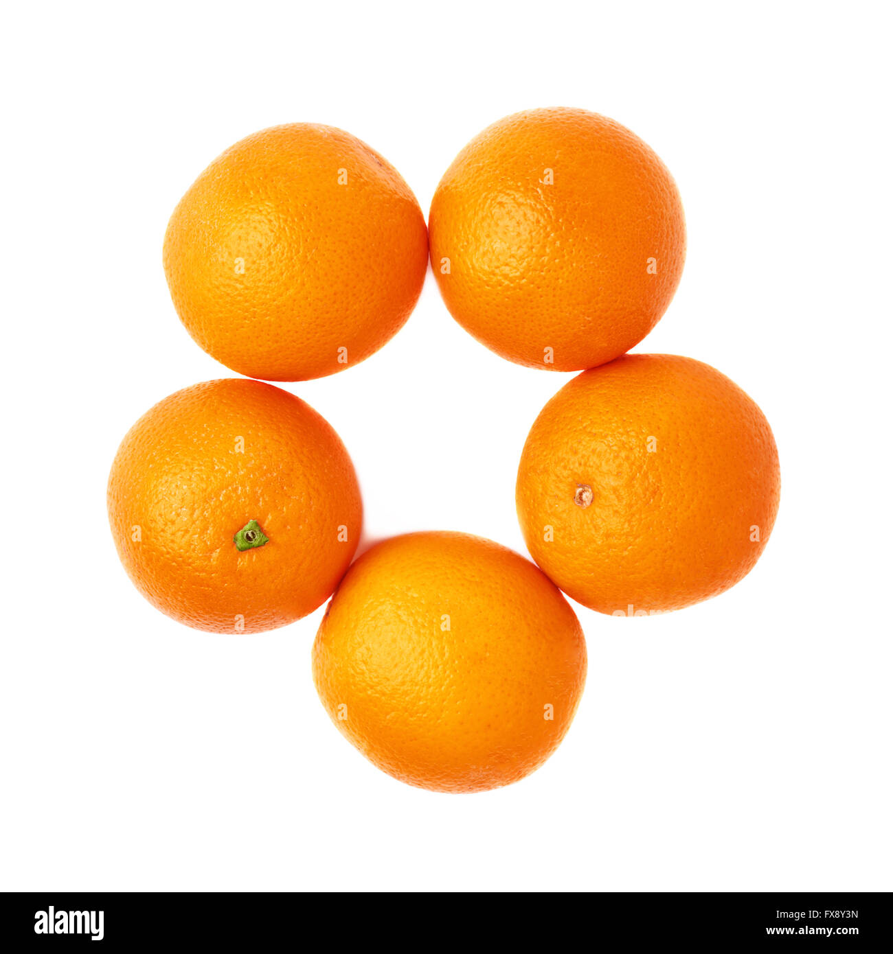 Multiple ripe oranges aligned in a circle round frame, isolated over ...