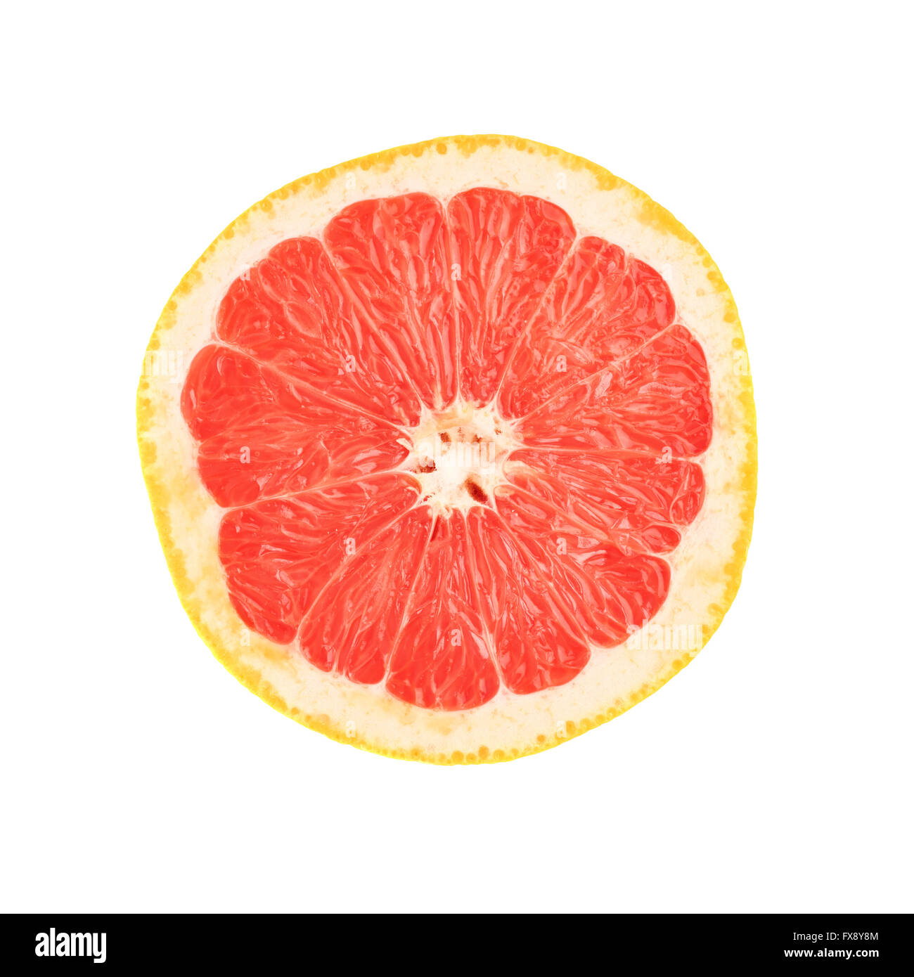 Single ripe grapefruit cut in half isolated over the white background ...