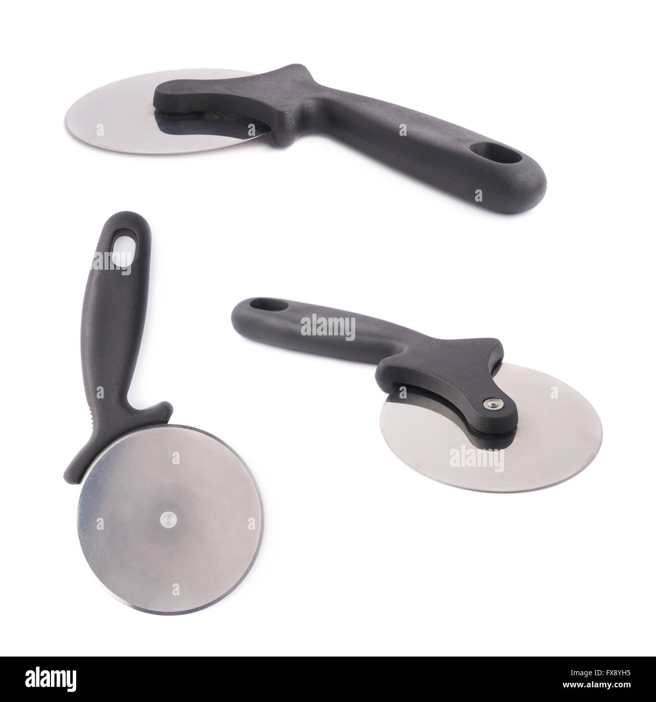 Metal pizza cutter wheel isolated Stock Photo - Alamy