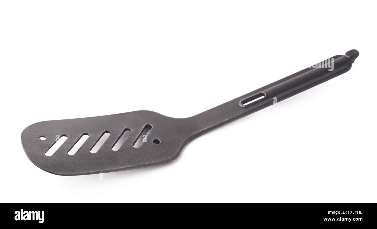 Used black plastic spatula isolated Stock Photo - Alamy
