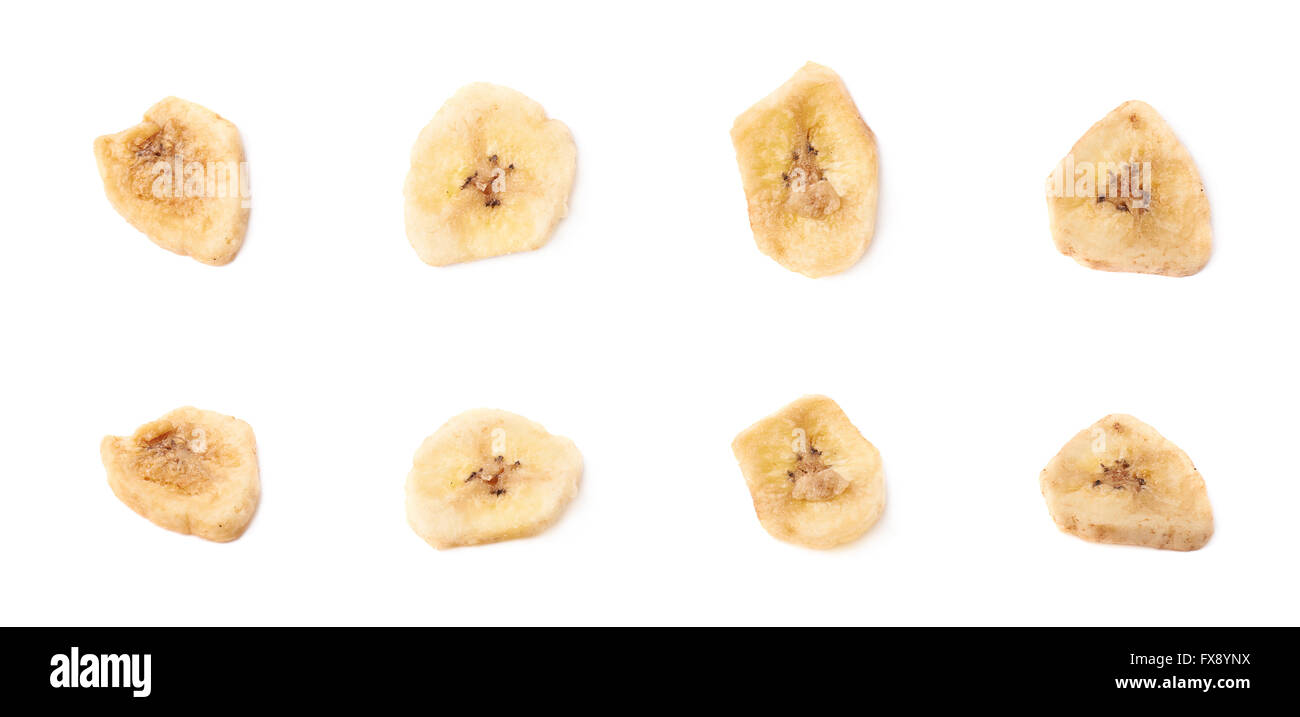 Multiple dried banana slices snacks isolated Stock Photo - Alamy