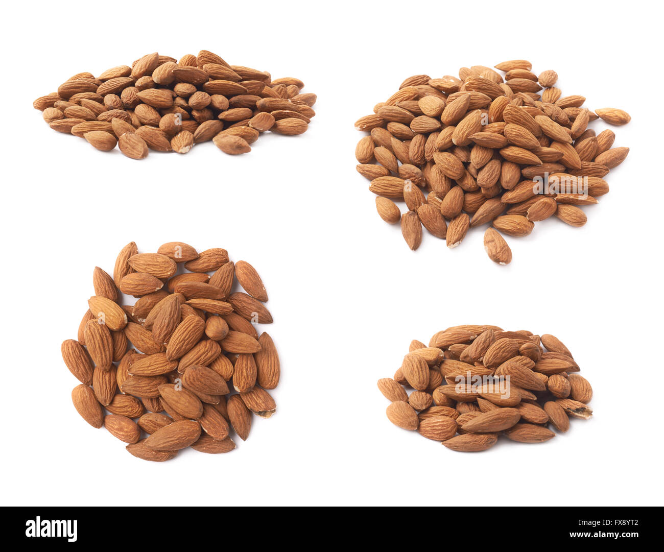 Pile of multiple almond seeds isolated Stock Photo - Alamy