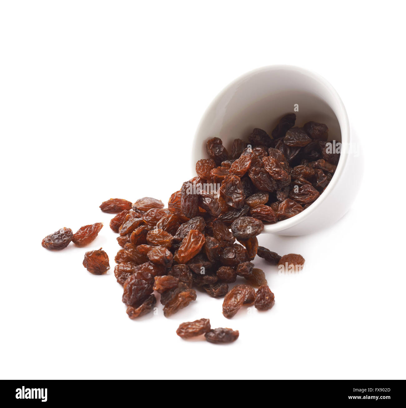 Cup filled with raisins isolated Stock Photo - Alamy