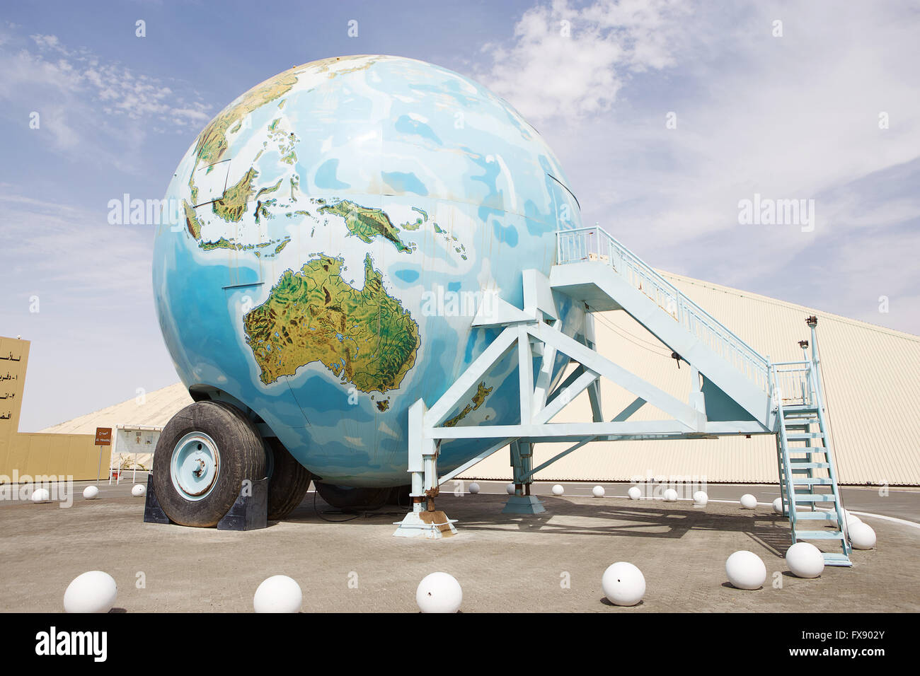 Huge globe trailer in the shape of the world Stock Photo - Alamy